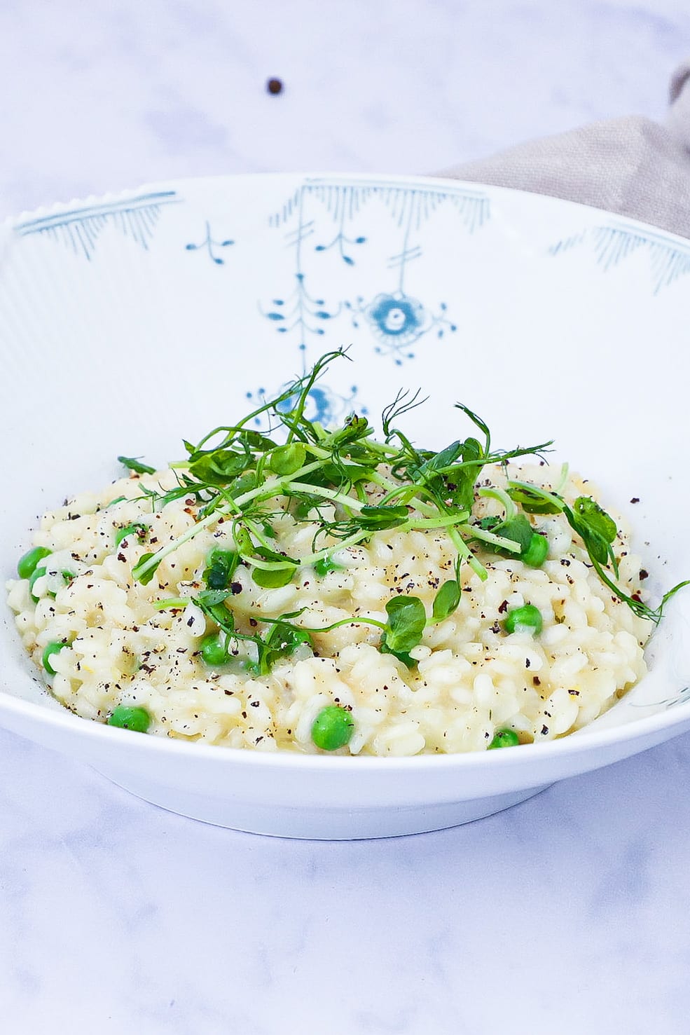 Citronrisotto med ærter - Opskrift på cremet risotto med citron