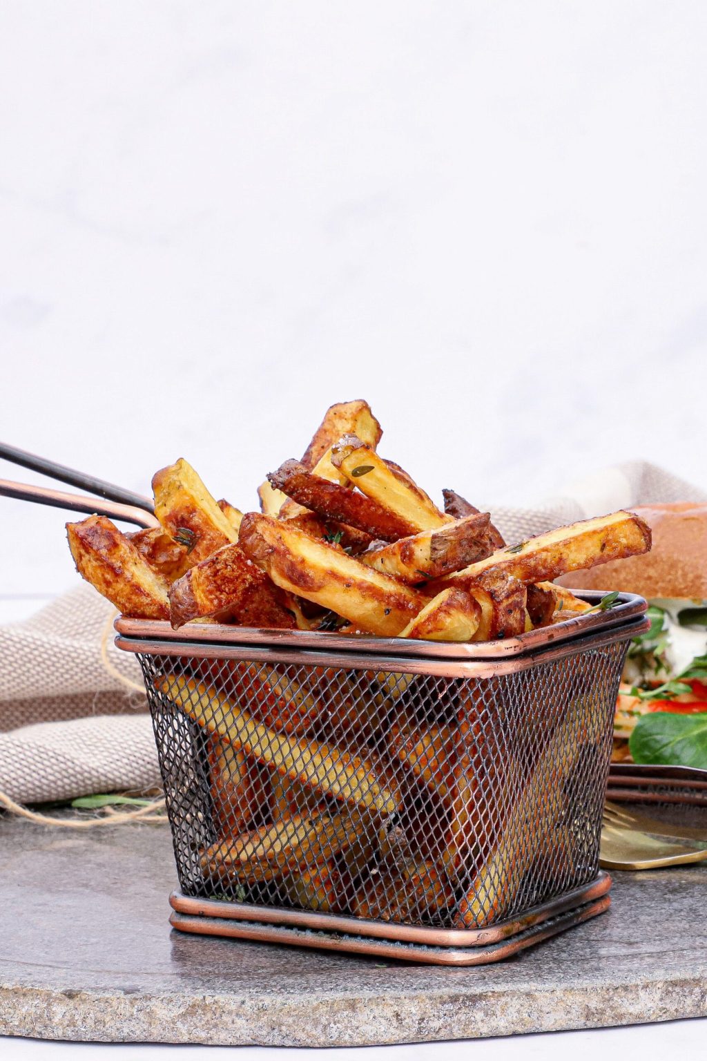 Sprøde pommes frites i ovnen - Opskrift på hjemmelavede pommes frites
